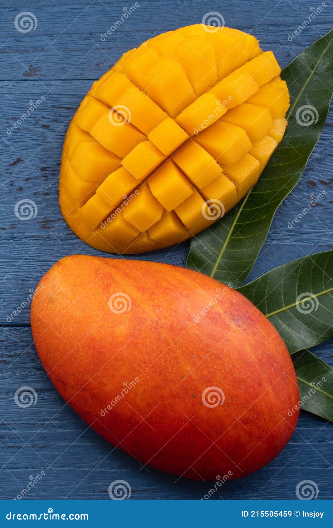 Top View Design Concept of Beautiful Mango Fruit Over Blue Table ...