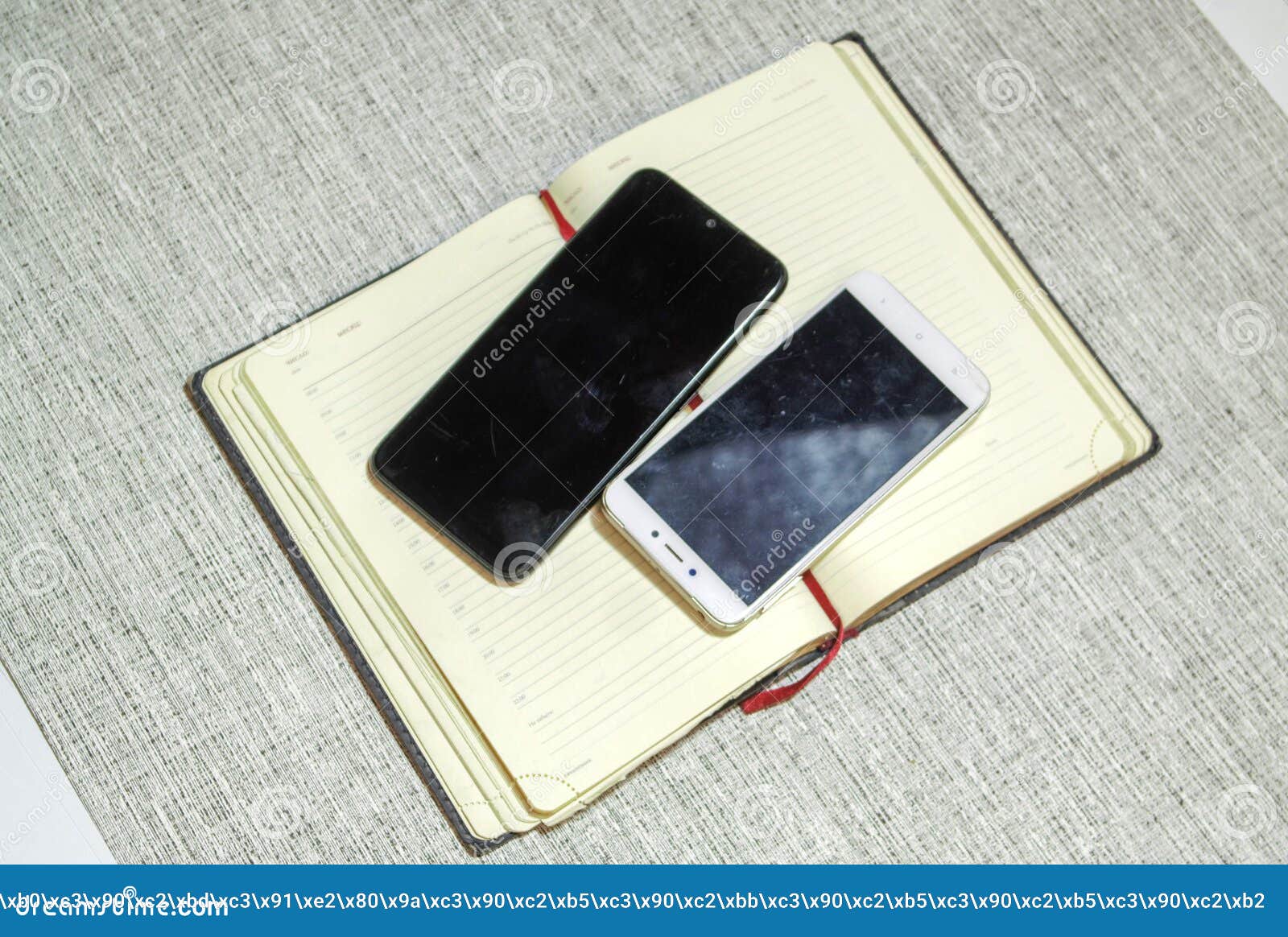 Top View of a Desktop with Two Empty Mobile Phones and a Notepad Stock ...