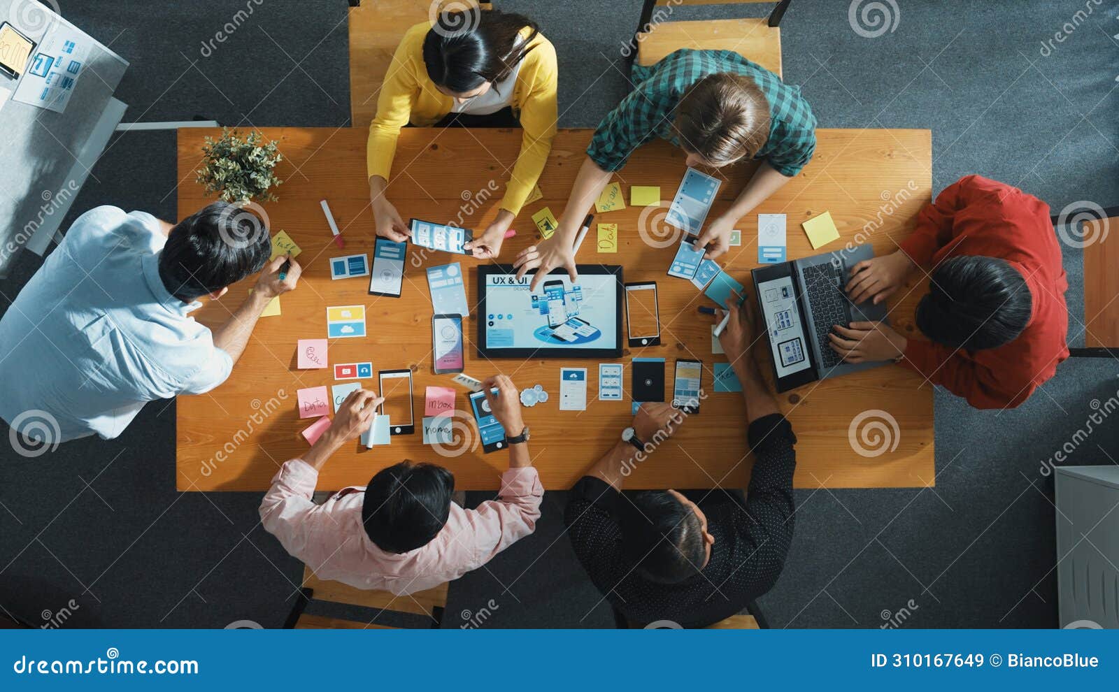 Top View of Developer Team Working Together To Stick Idea on Board ...