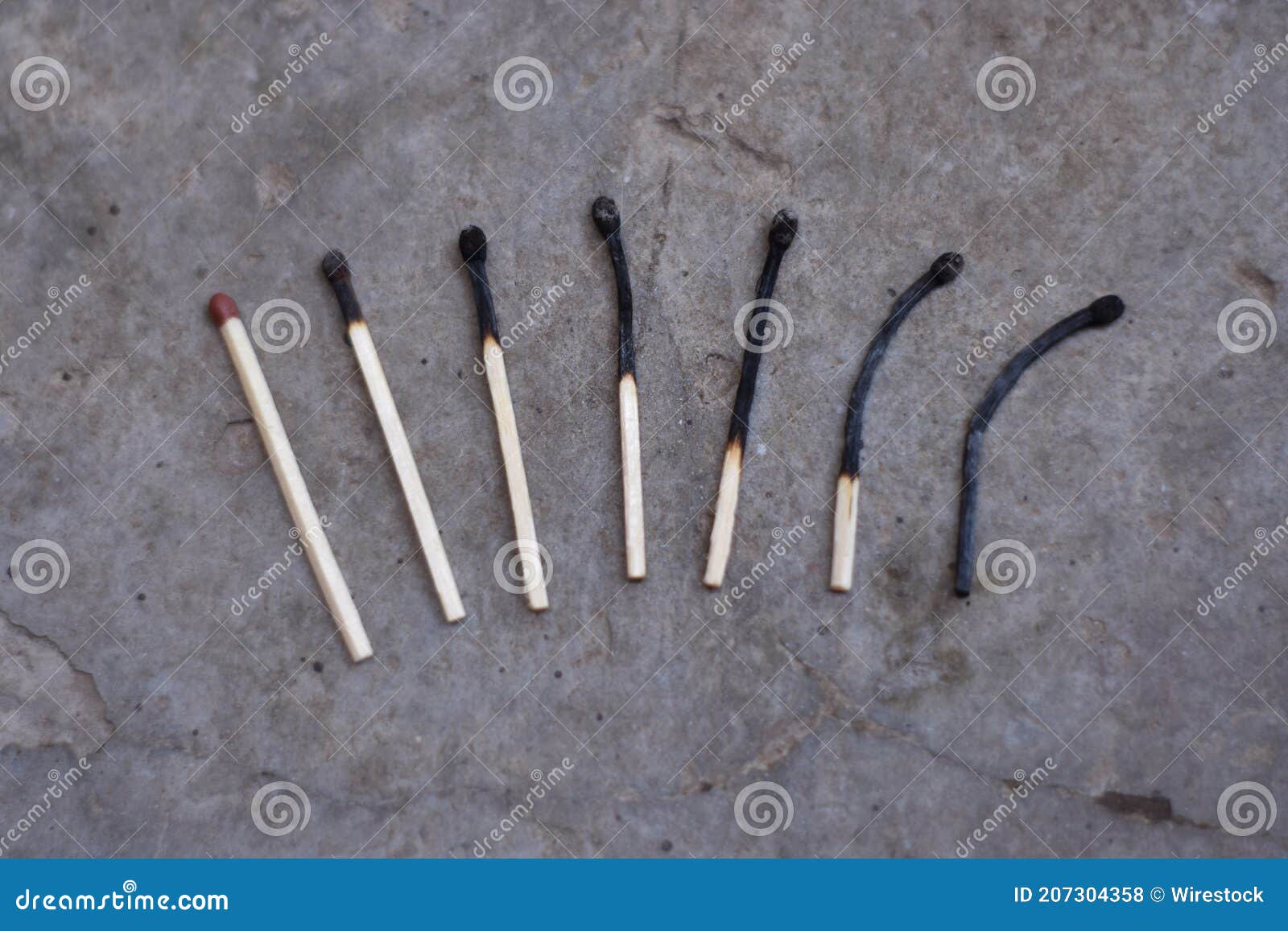 Top View of Different Stages of Burned Fire Matches on a Concrete ...