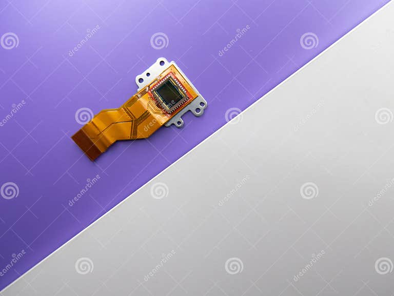 Top View of a Digital Camera Sensor on a Purple Background with a Copy ...