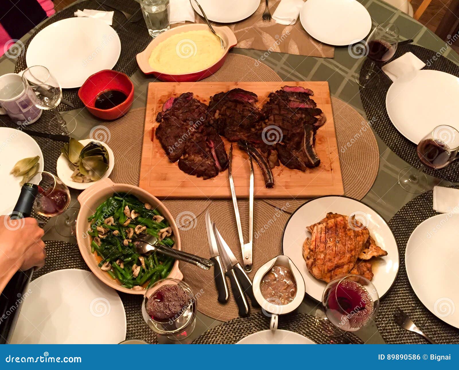 Top View of Dinner Table with Beef Steak and Chicken Breast and Stock ...