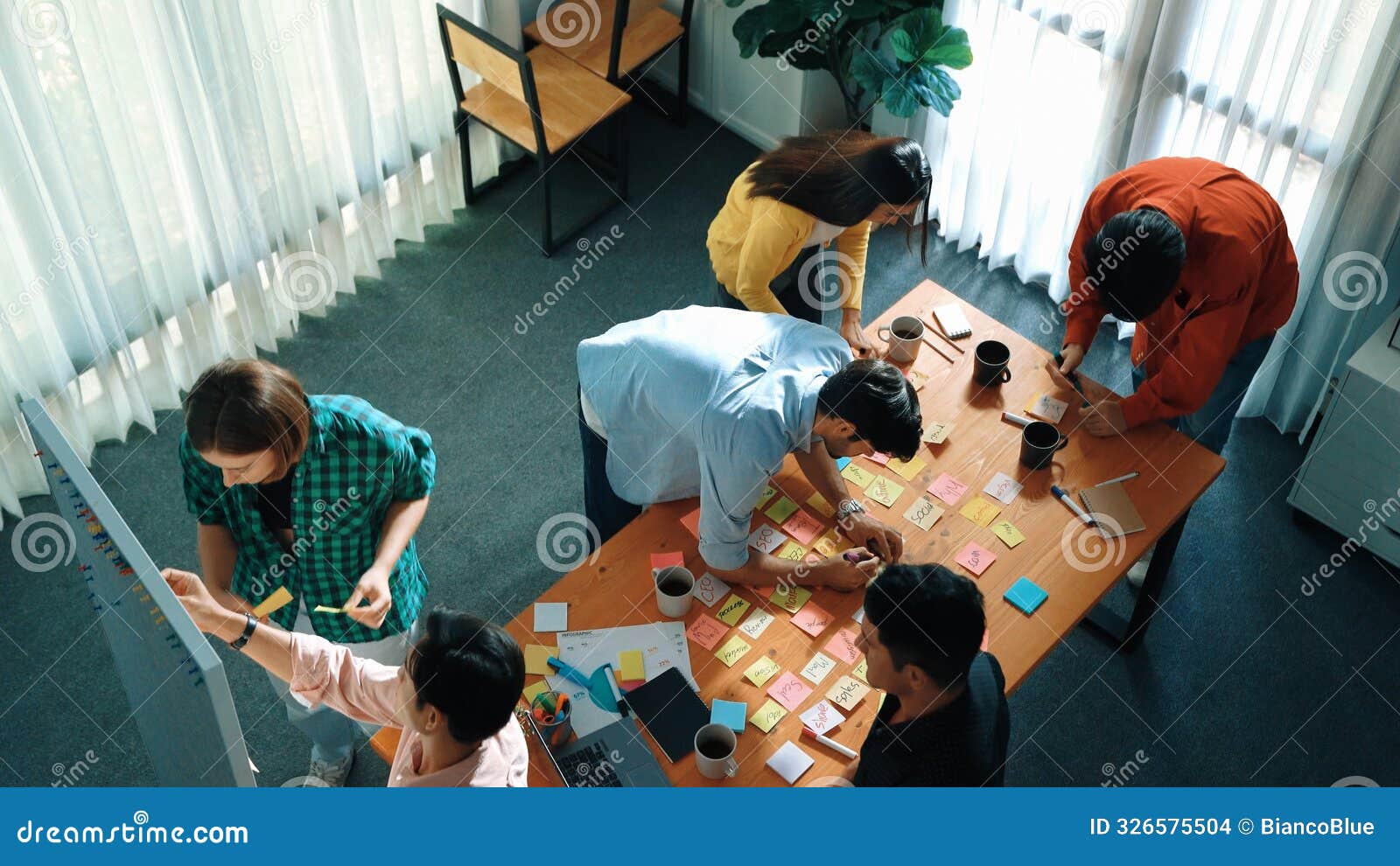 Top View of Diverse People Writing and Stick Sticky Notes at Board ...