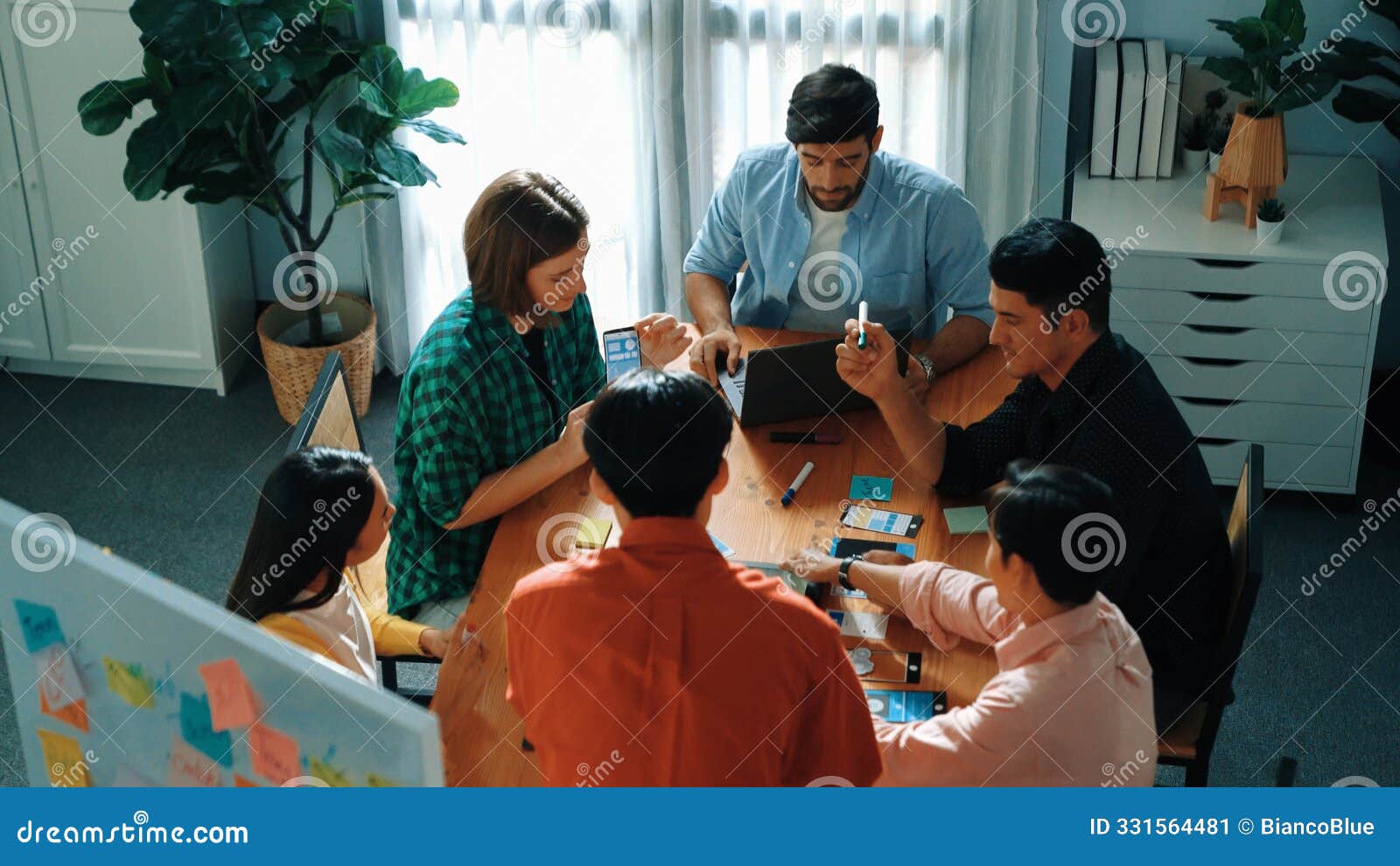 Top View of Diverse People Writing and Stick Sticky Notes at Board ...