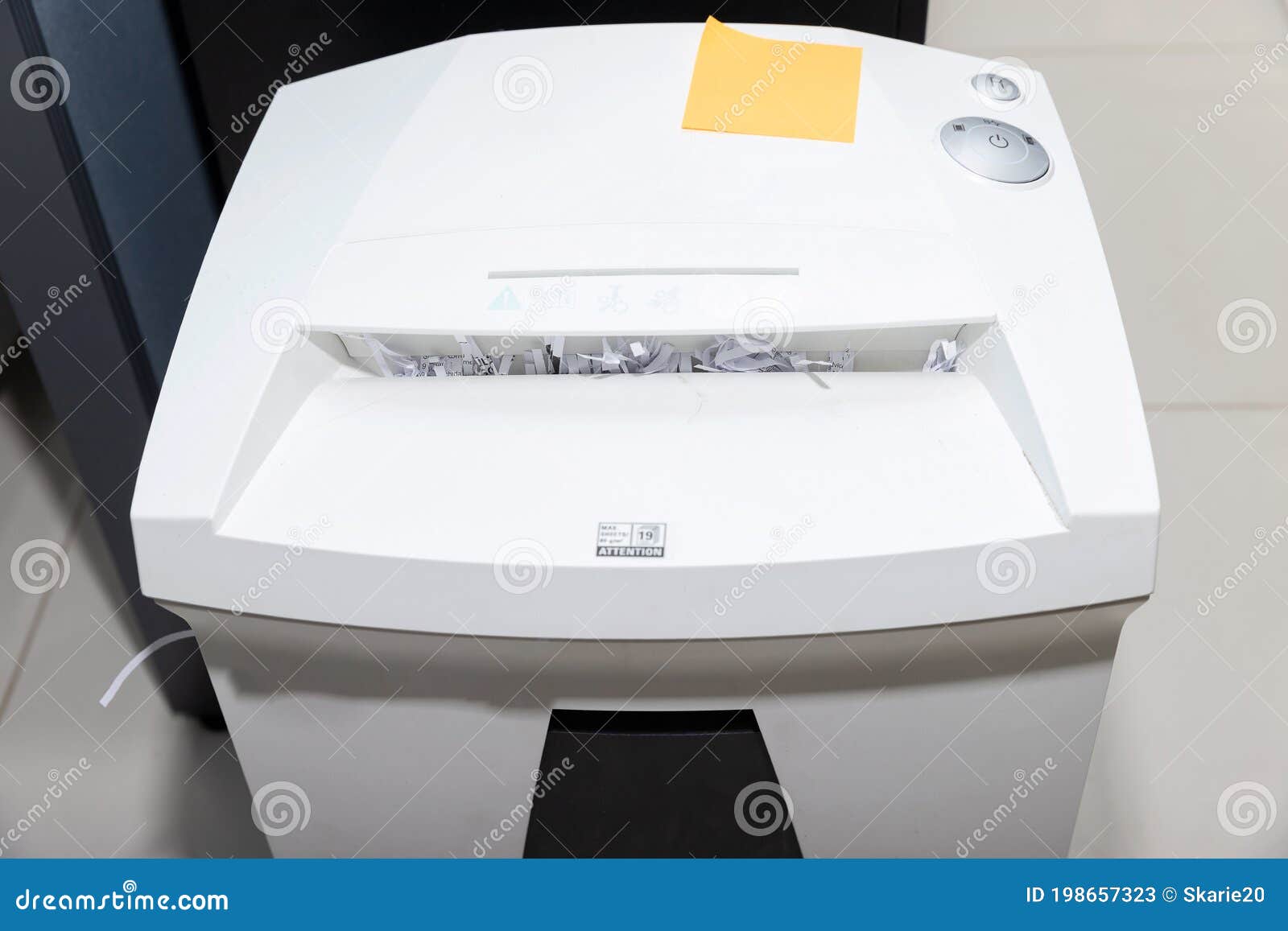 Top View of Document Shredder with Papers Overflowed from Inside the ...