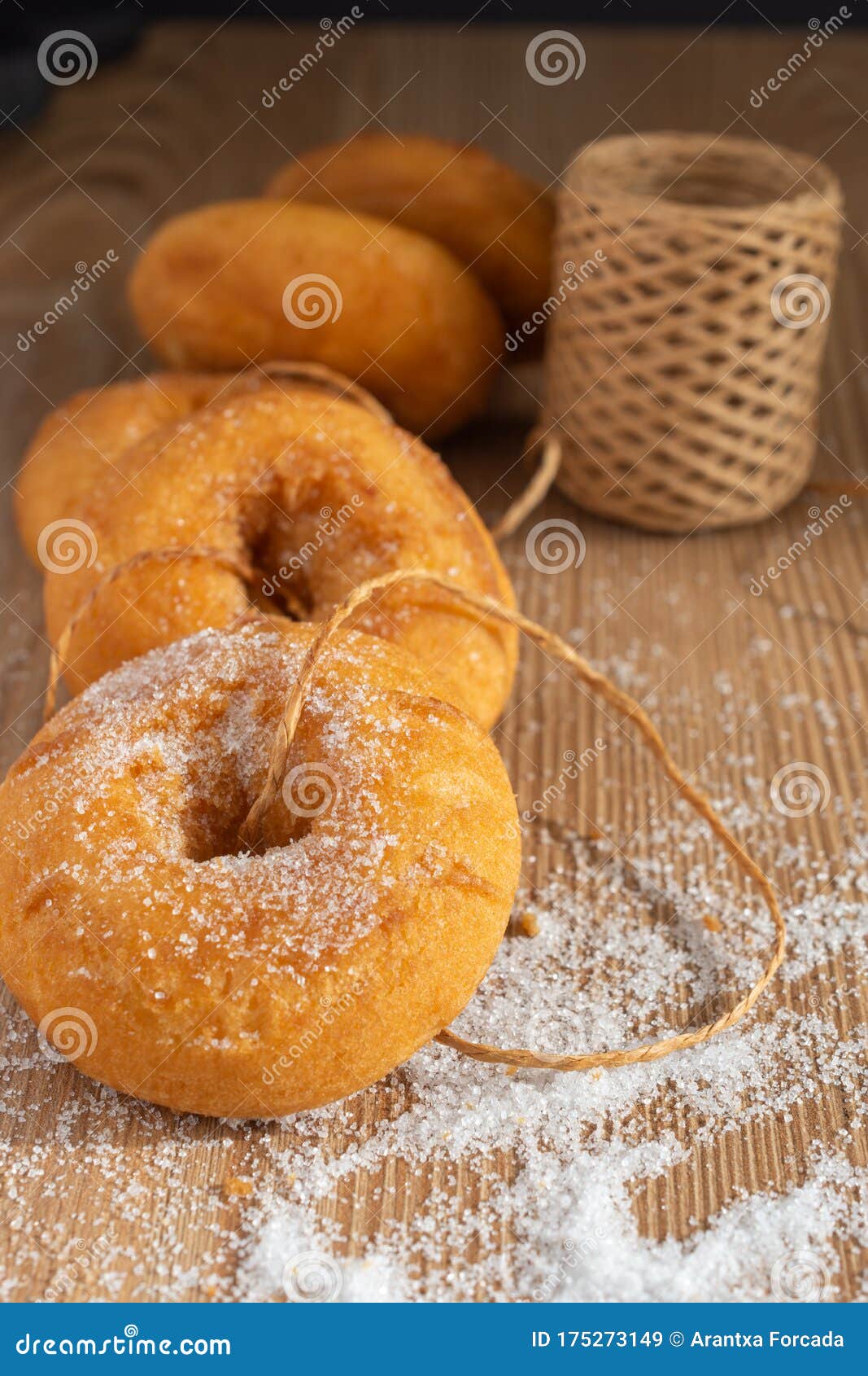 Top View of Donuts with Rope and Sugar Roll on Wooden Table Stock Image ...
