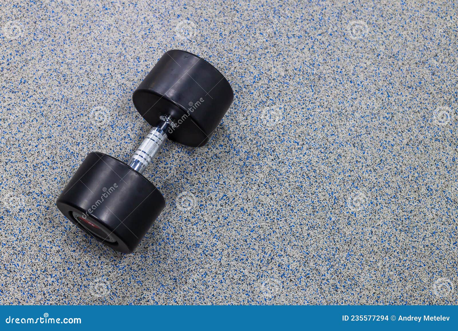 Top View of a Dumbbell Lying on the Floor. Equipment for Strength ...