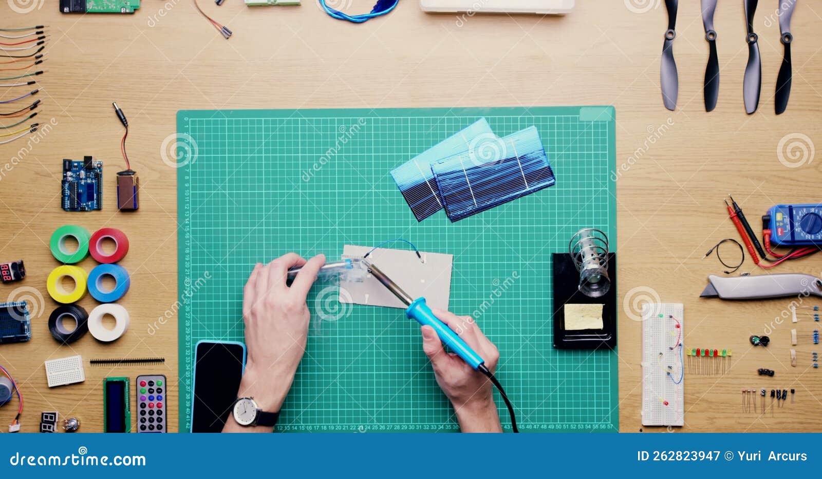 Top View of Electrician Soldering a Circuit Board for Engineering ...