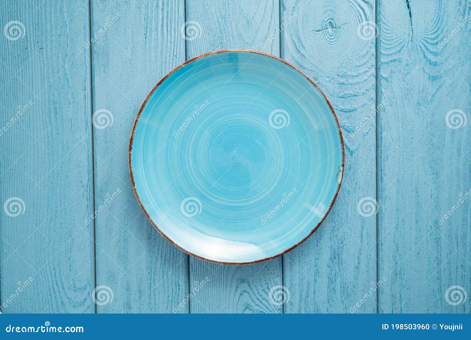 TOP VIEW: Empty Blue Bowl on Blue Wooden Table Stock Photo - Image of ...
