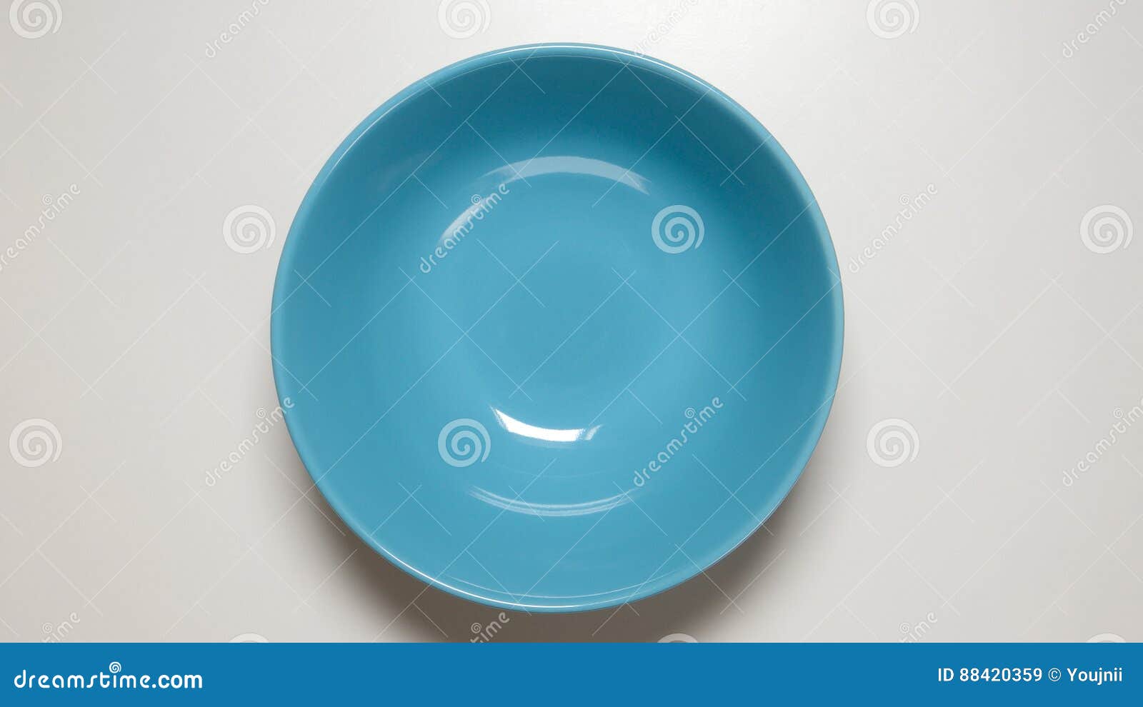 TOP VIEW: Empty Blue Dish on a White Table Stock Image - Image of bowl ...
