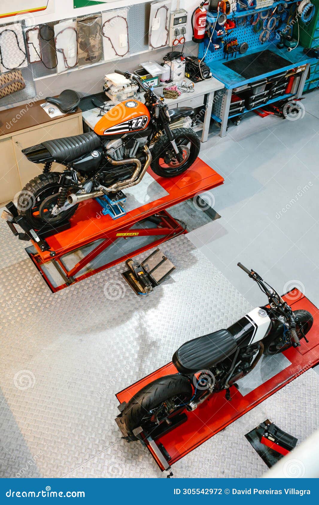 Top View of Empty Motorcycle Workshop with Custom Motorbikes Over ...