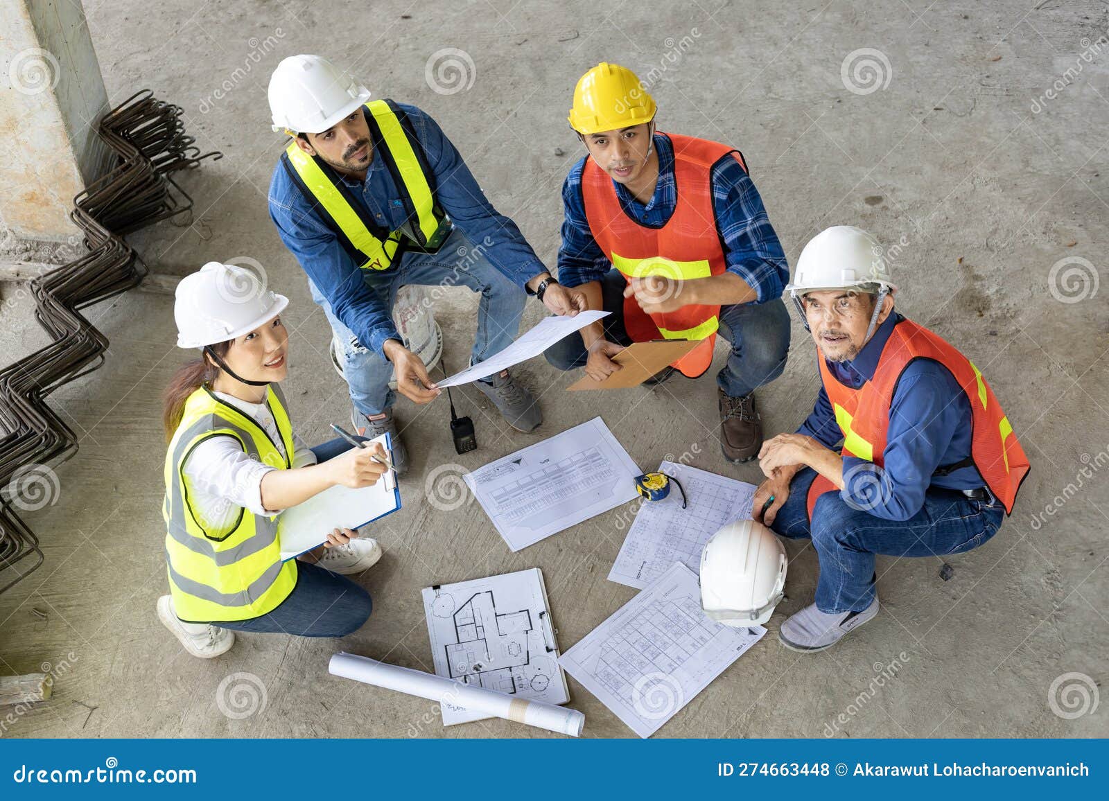 Top View of Engineer, Architect, Contractor and Foreman Meeting at the ...