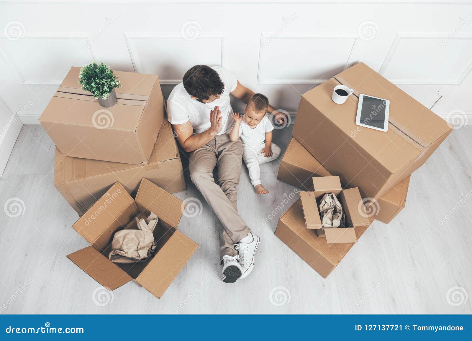 Top View. Father and Son Moving into a New Home Stock Image - Image of ...