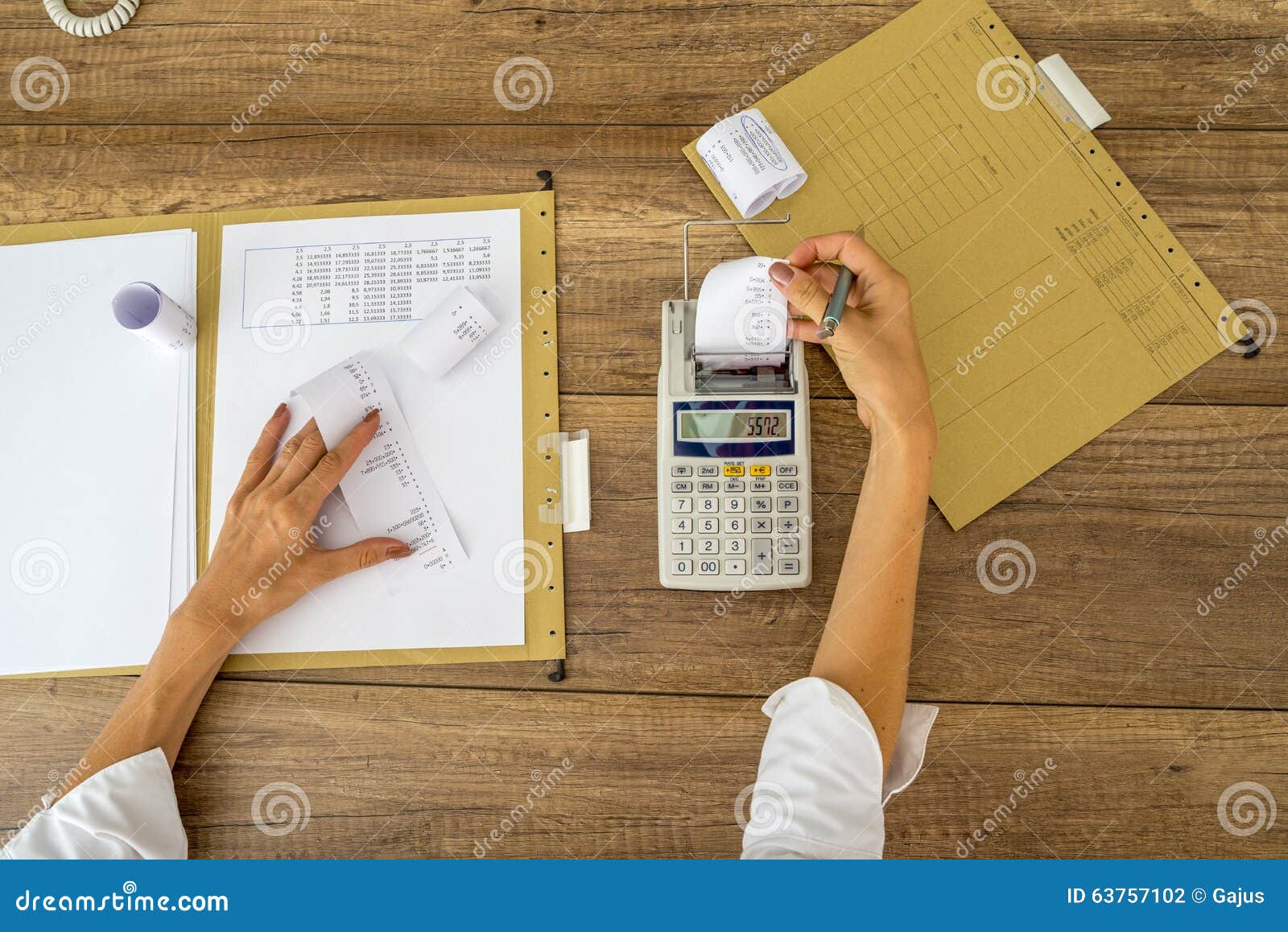 Top View of Female Accountant Making Calculations Using Adding M Stock ...