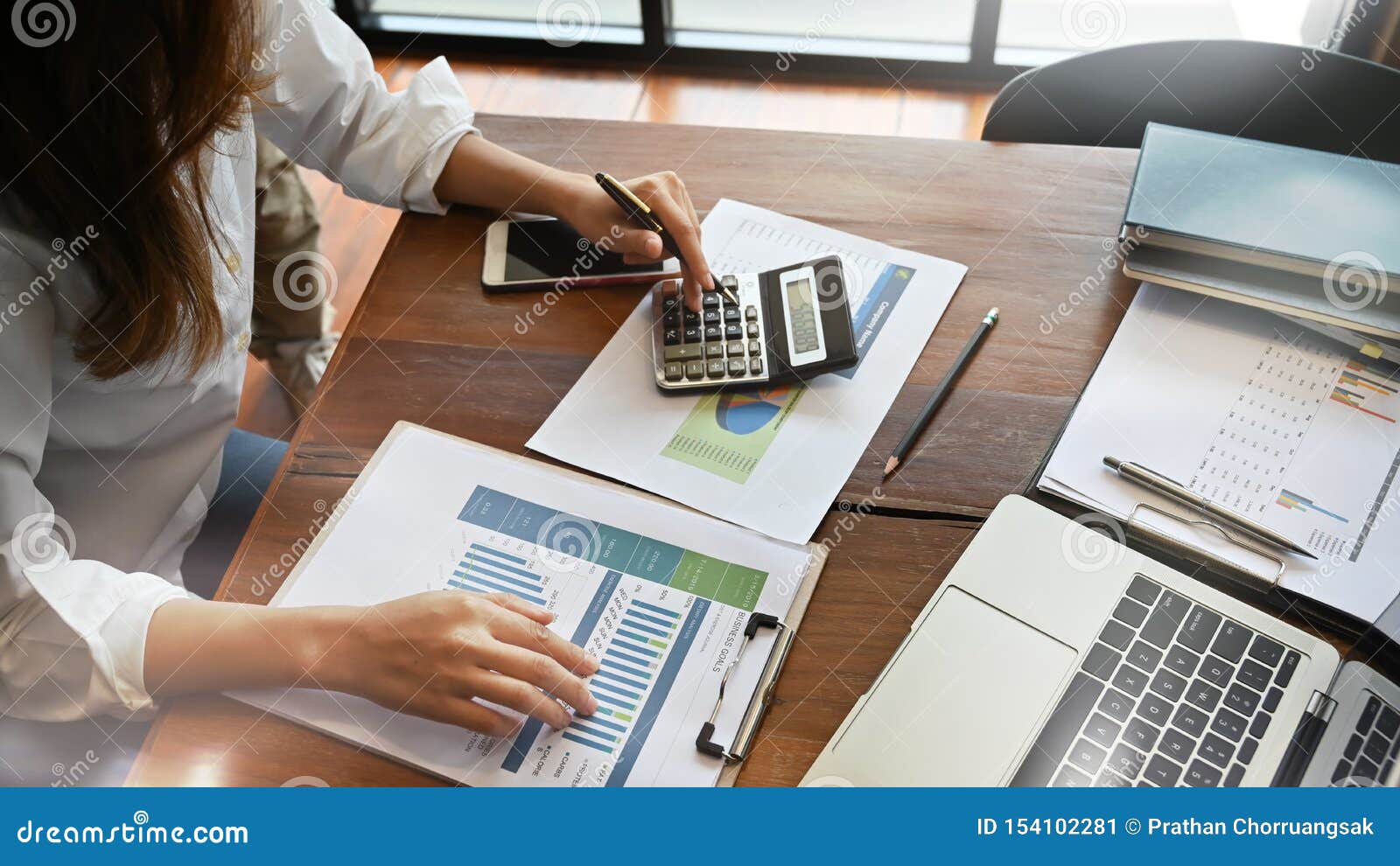 Top View Female Calculate Finance Data on Calculator Stock Image ...