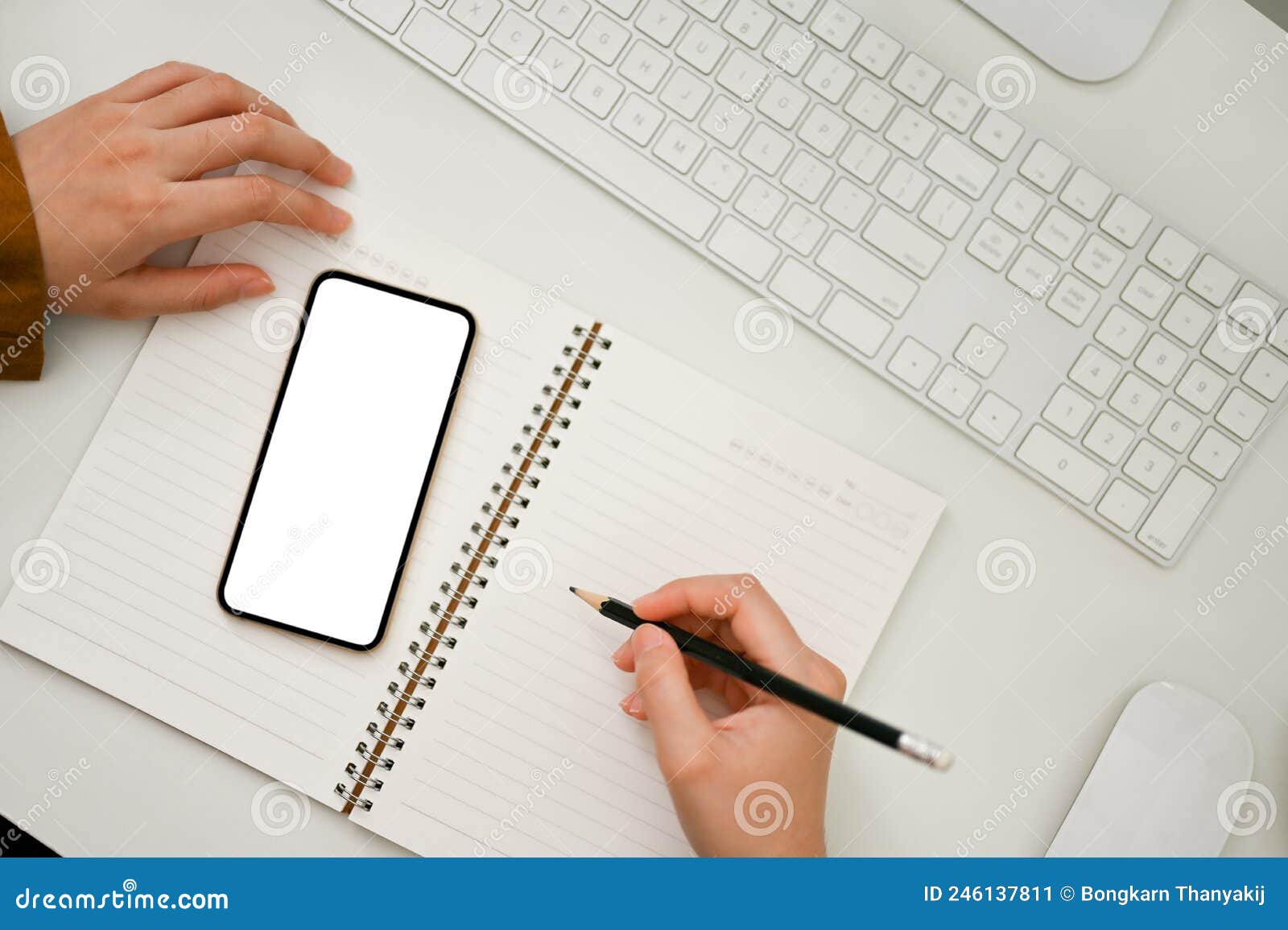 Top View, Female Writing on Empty Spiral Notebook and Using Smartphone ...
