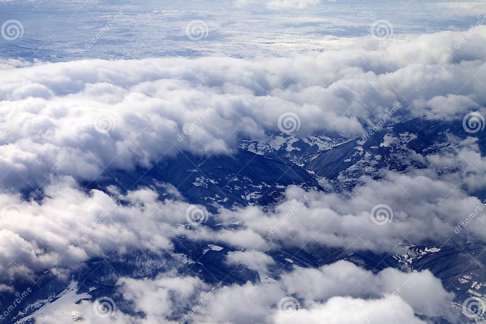 Top View on Fields and Hills in Mist Stock Photo - Image of covered ...