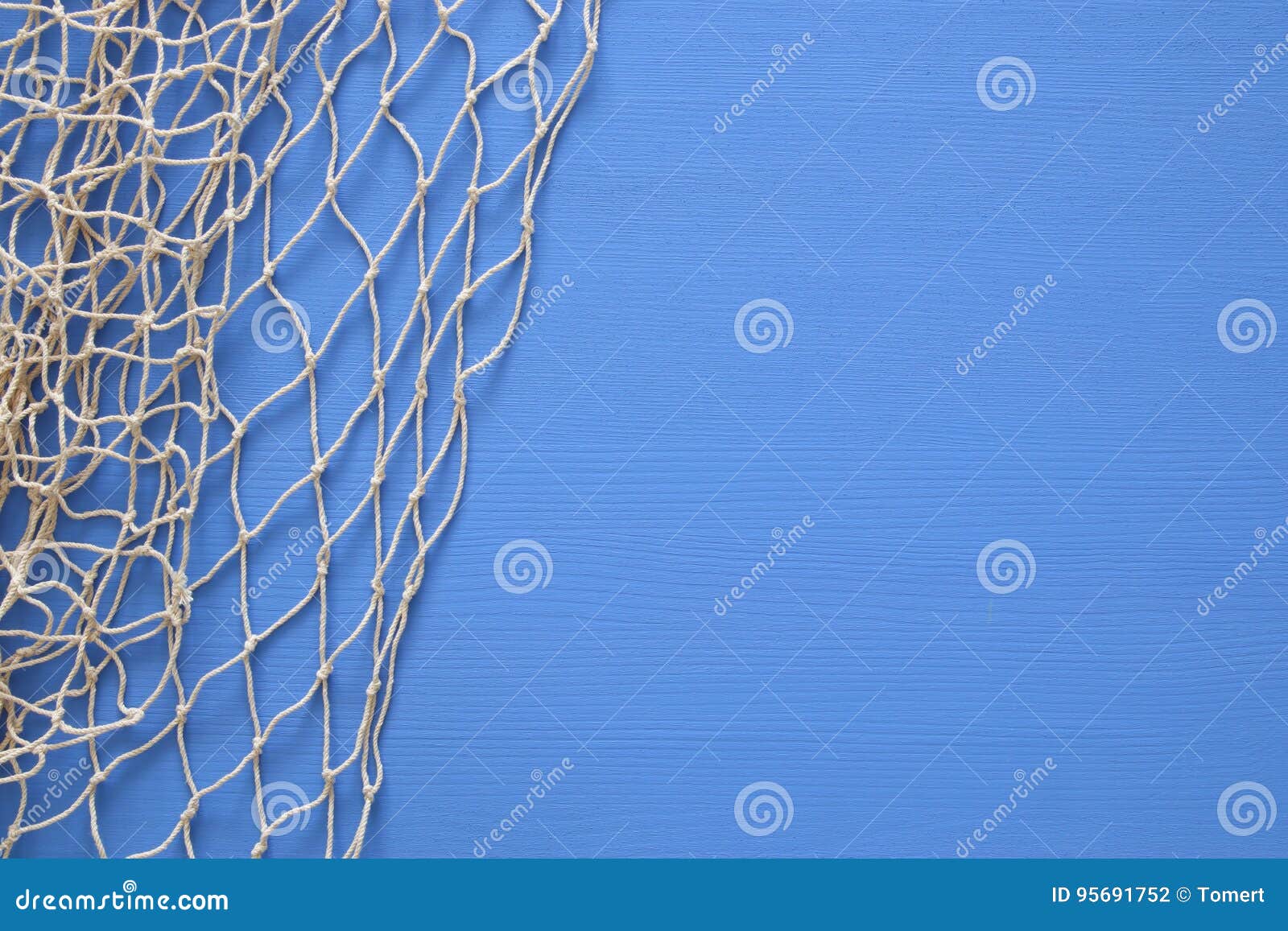 Top View of Fishnet on Blue Wooden Background Stock Photo - Image of ...