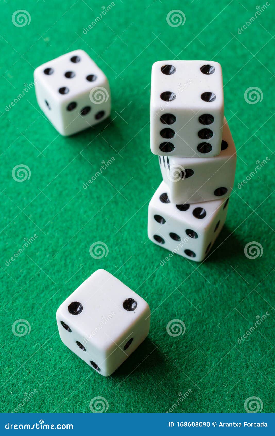 Top View of Five Dice, Three Stacked, on Green Mat, Vertically Stock ...