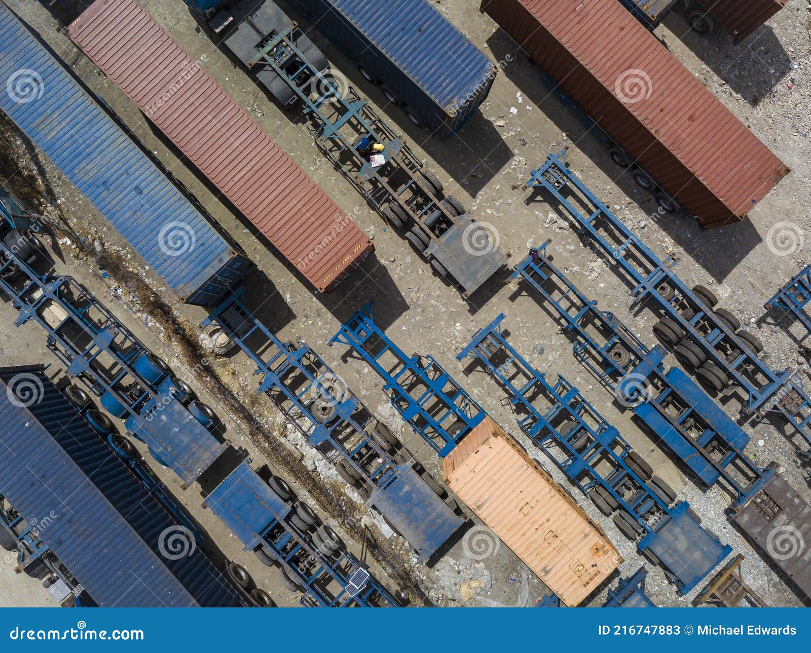 Top View of Flatbed Semi Trailers and Containers for Rent Stored in an ...