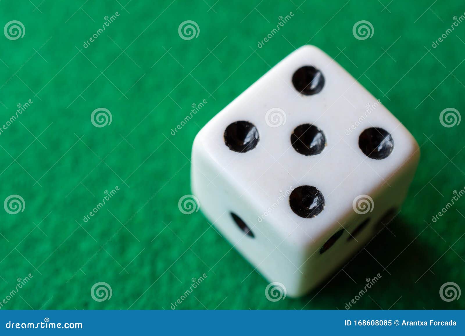 Top View in the Foreground of Dice with the Number Five, on Green Mat ...