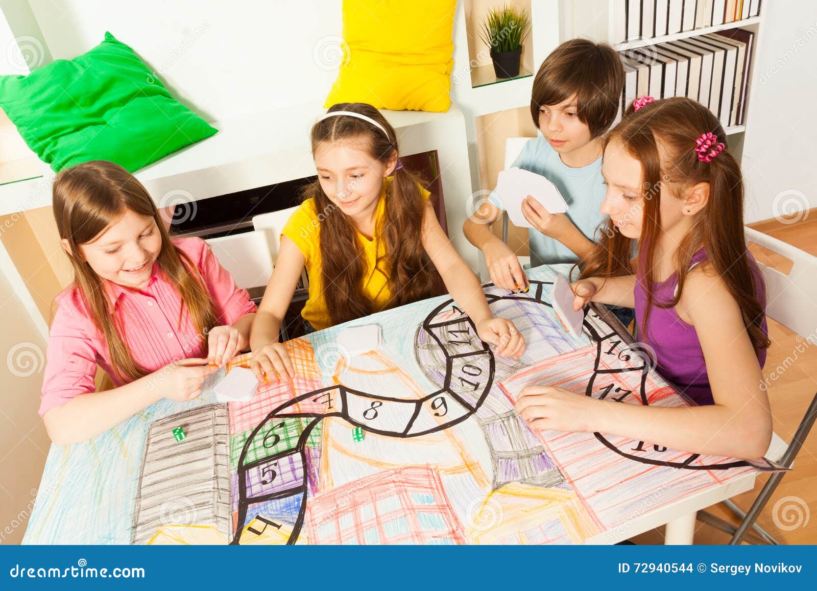 Top View of Four Kids Playing the Tabletop Game Stock Photo - Image of ...