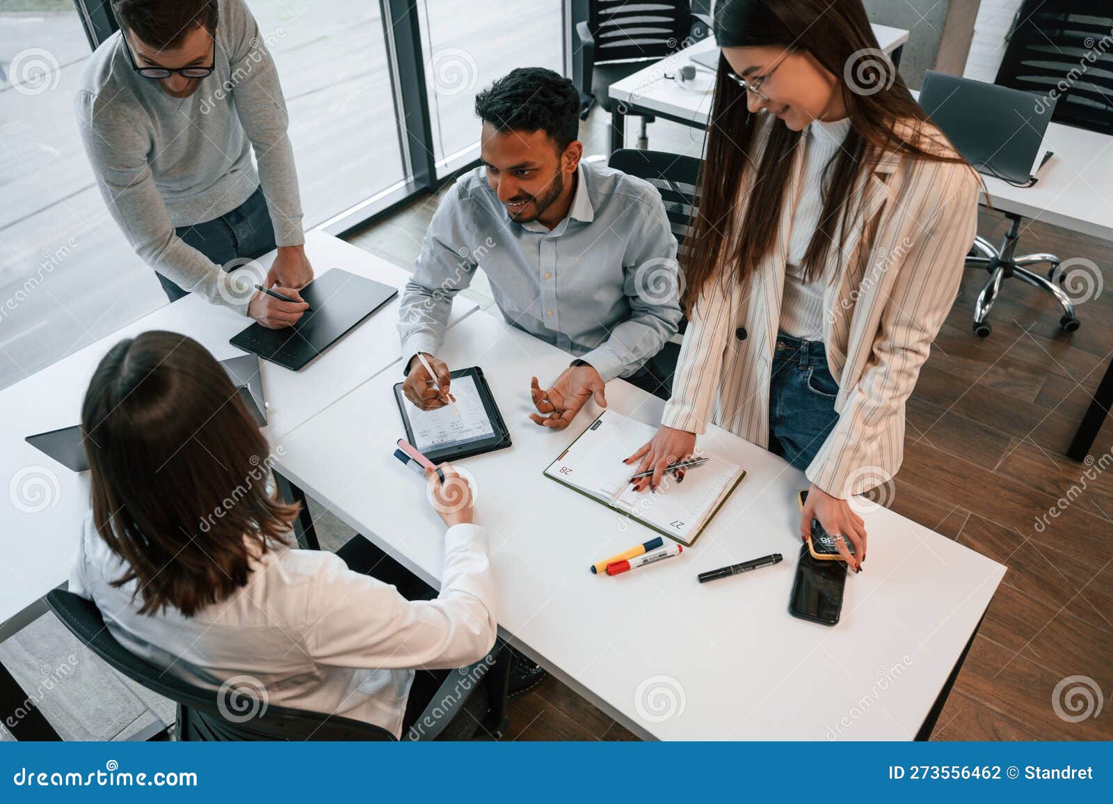 Top View. Four People are Working in the Office Together Stock Photo ...