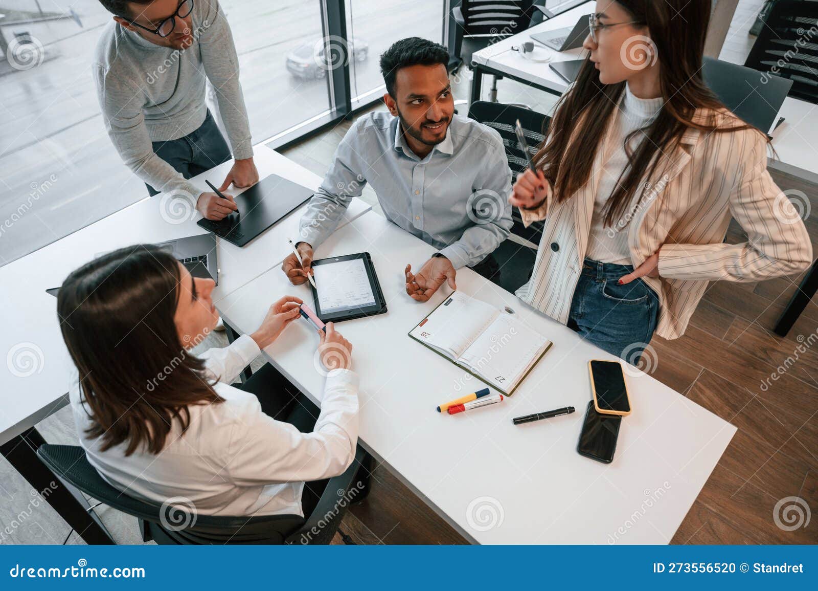 Top View. Four People are Working in the Office Together Stock Photo ...