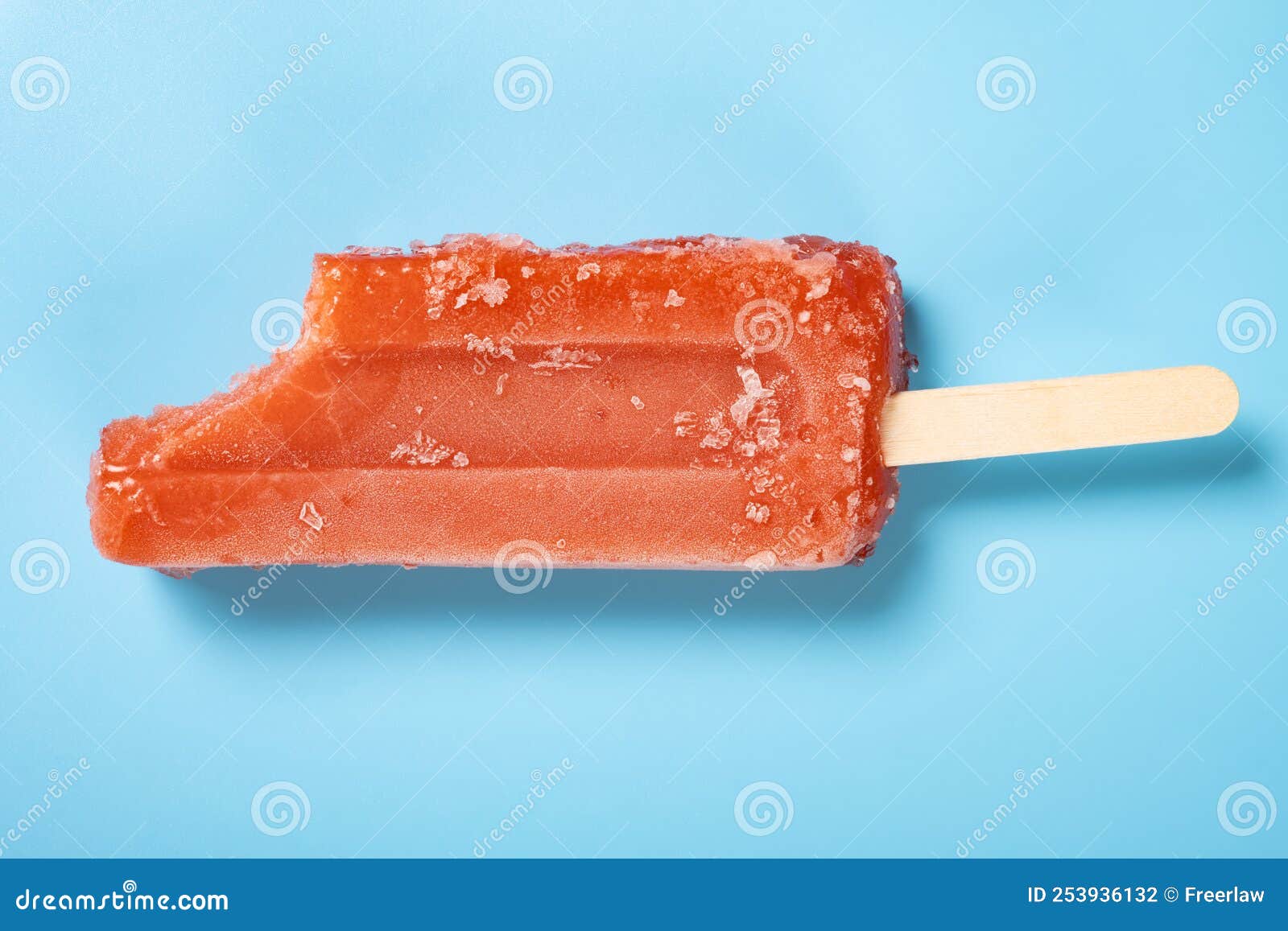 Fresh Red Popsicle with a Bite on a Blue Background Stock Photo - Image ...