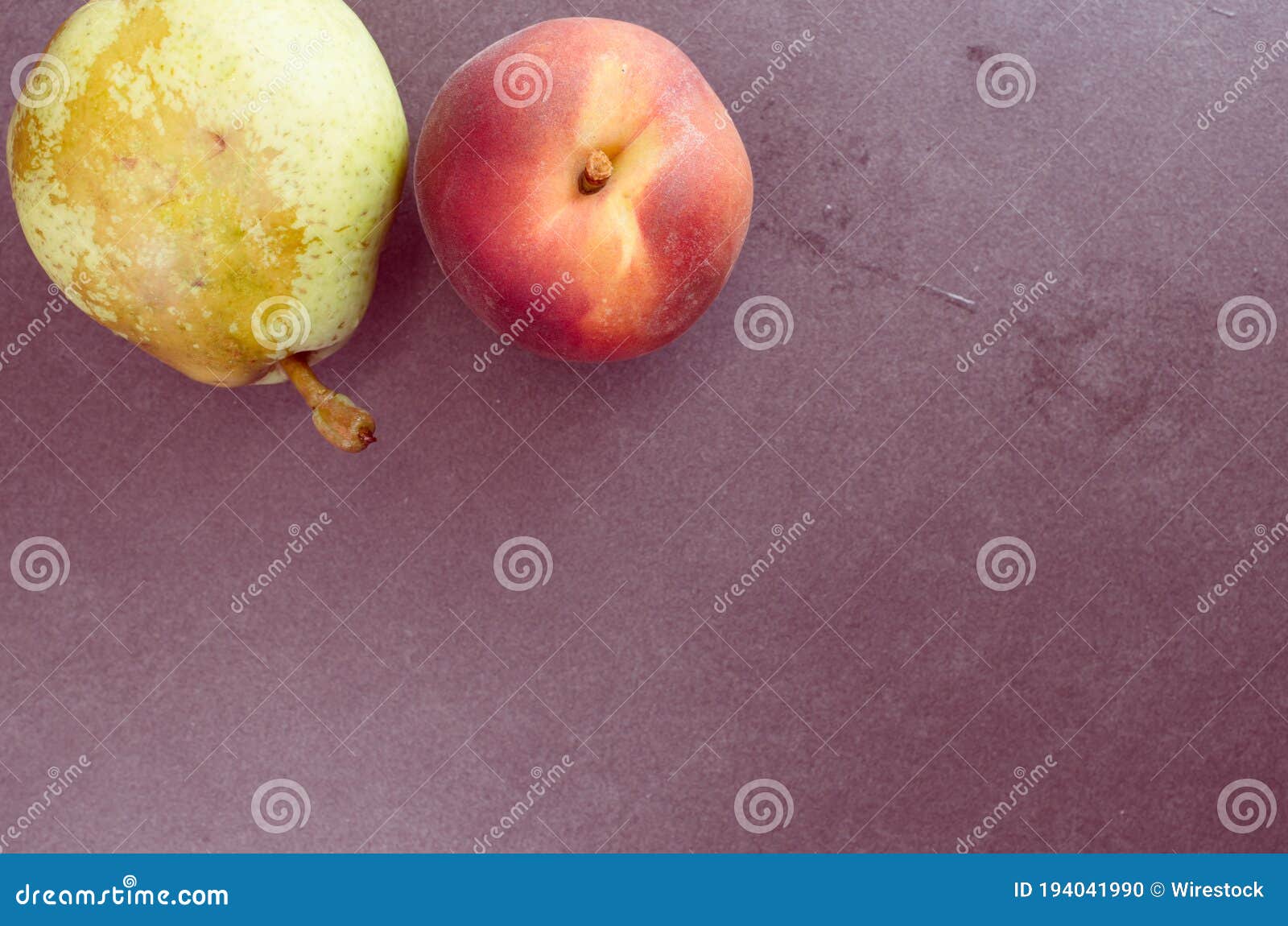Top View of Fresh Ripe Pear and Peach on a Stone Surface Stock Photo ...