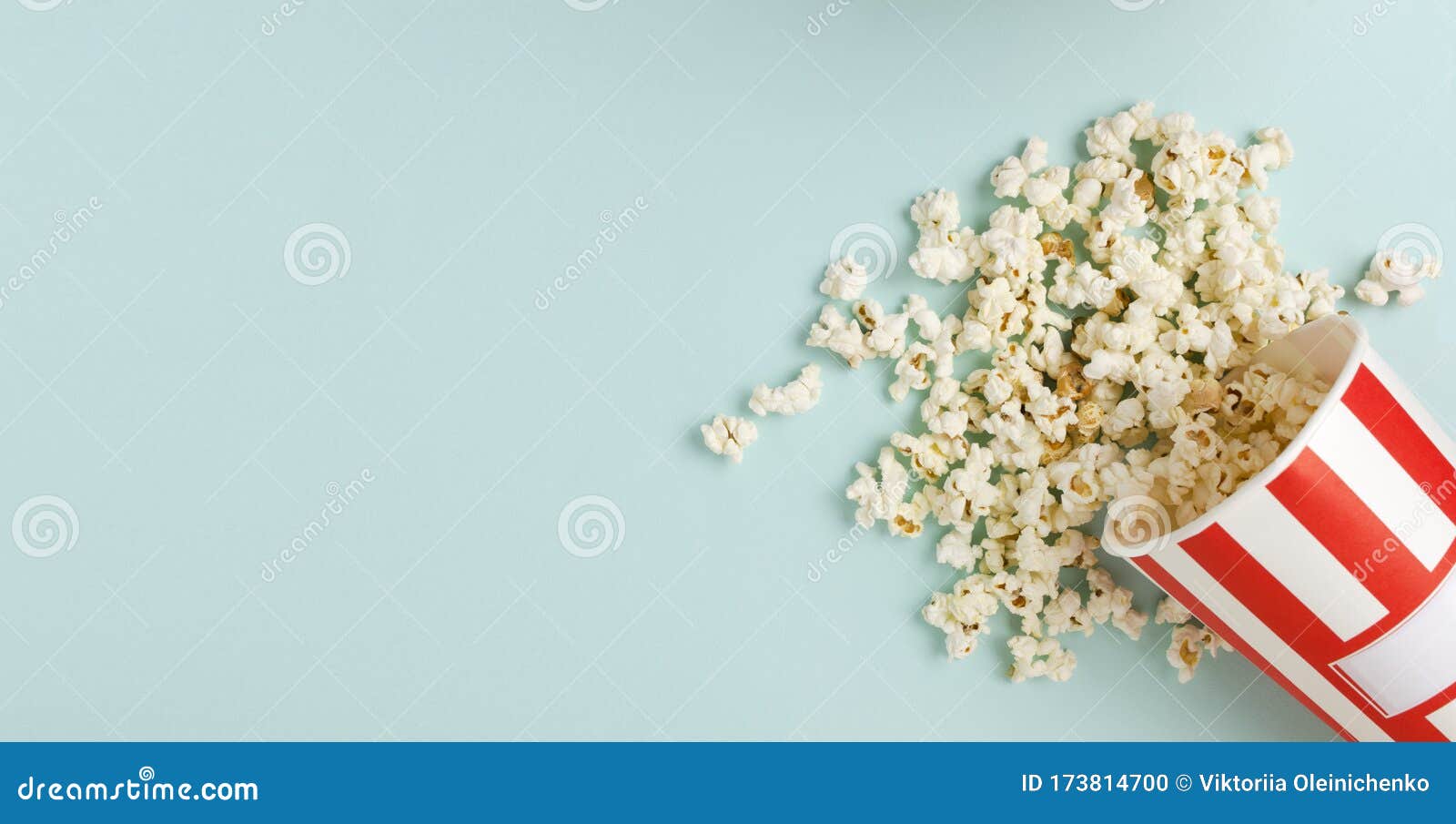 Top View of Fresh Spilled Popcorn from the Striped Paper Bowl on the ...