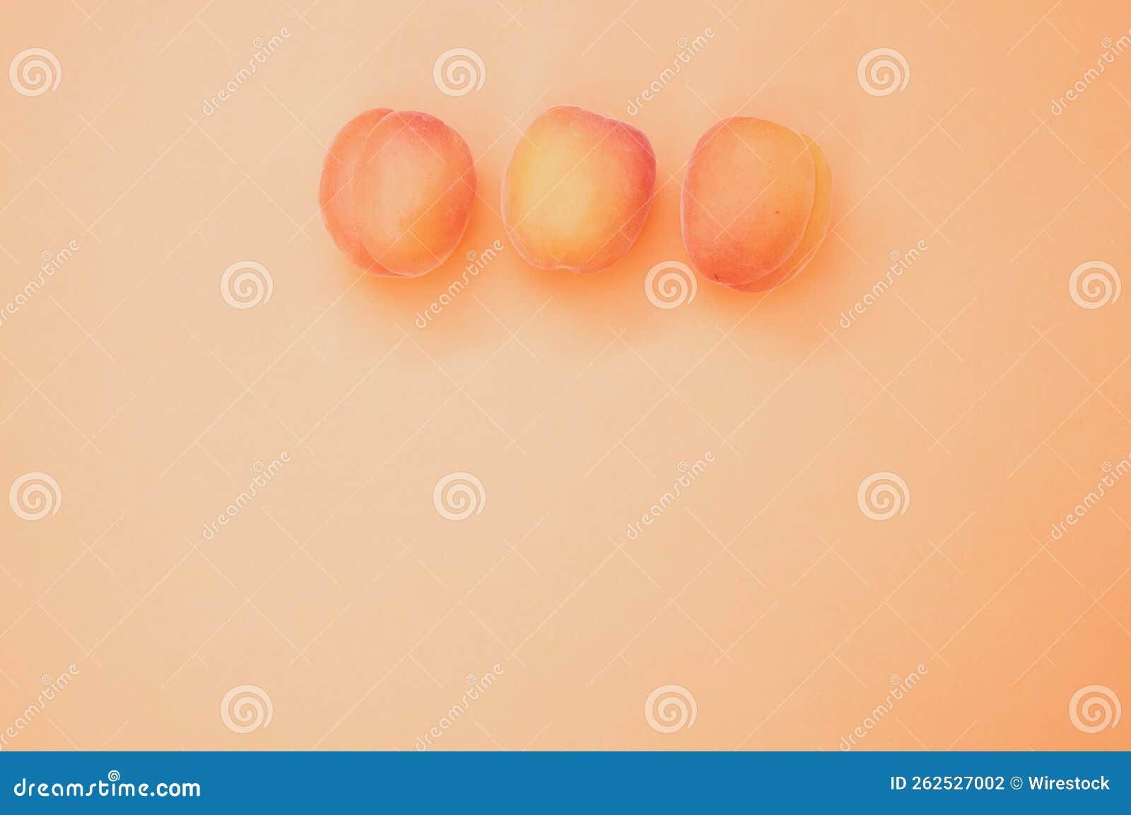 Top View of Fresh Three Apricots Isolated on Pastel Peach Background ...