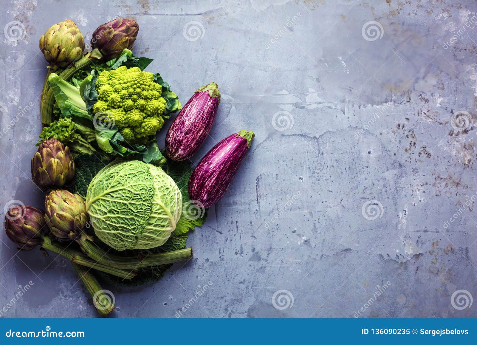 Top View on Fresh Vegetables Arranged Around Border on Grey Kitchen ...