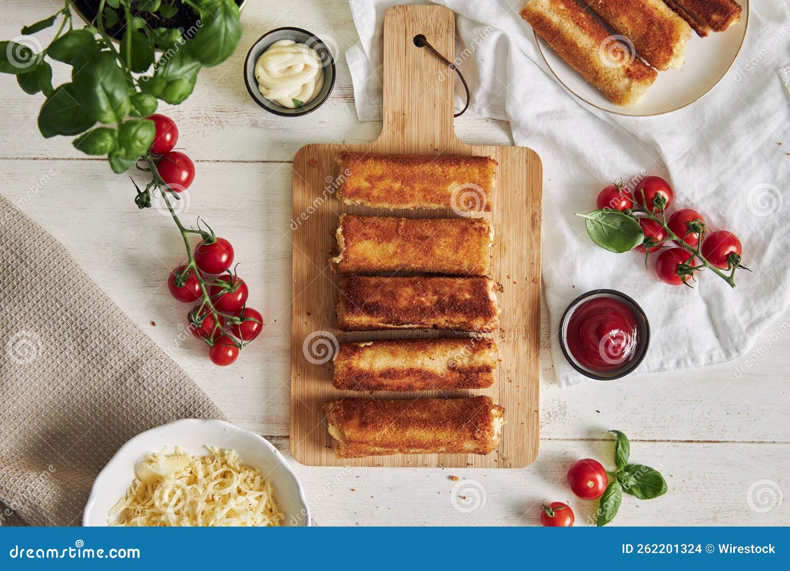 Top View of Fried Ham and Cheese Toast Rolls on a Board on the Table ...
