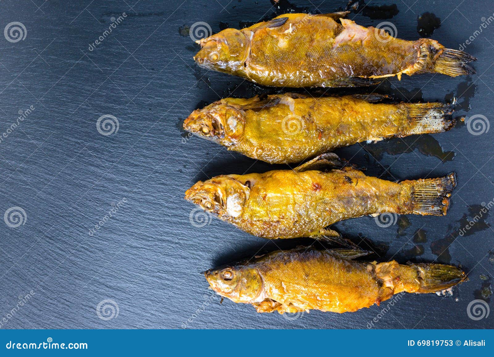 Top View of Fried Tench Fish Served on Slate Background, Close U Stock ...