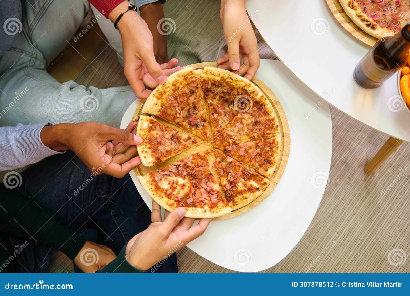 Top View of Friends Hands Grabbing a Pizza Slice in a Shared Flat ...
