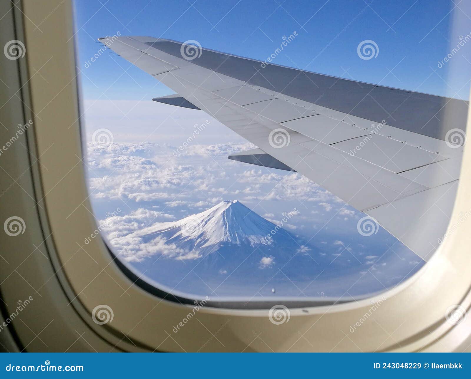 Top View - Mt Fuji From Sky View On Window Seat Of Plane. Blue Sky And ...