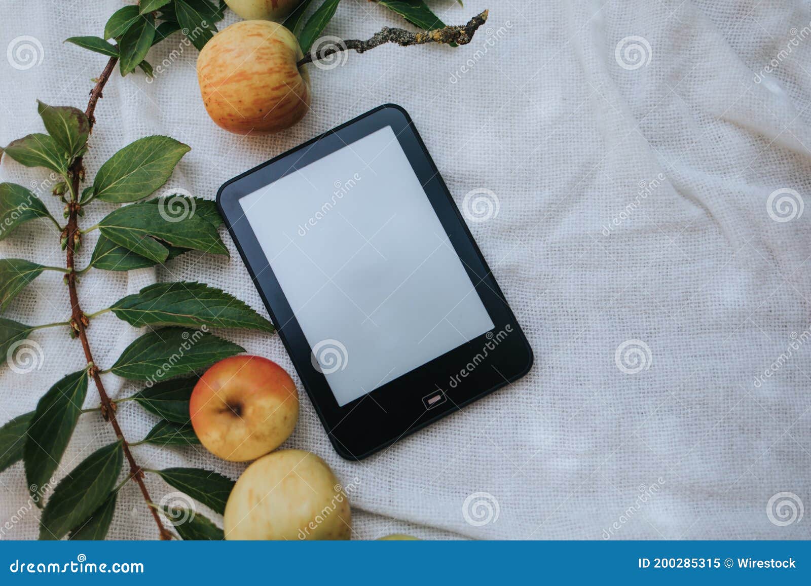 Top View of a Gadget and Apples on the Table Stock Image - Image of ...