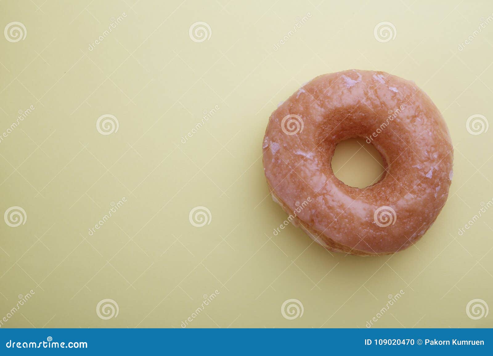 Top View Of Glazed Twist Donuts In Row On Parchment Paper Royalty-Free ...