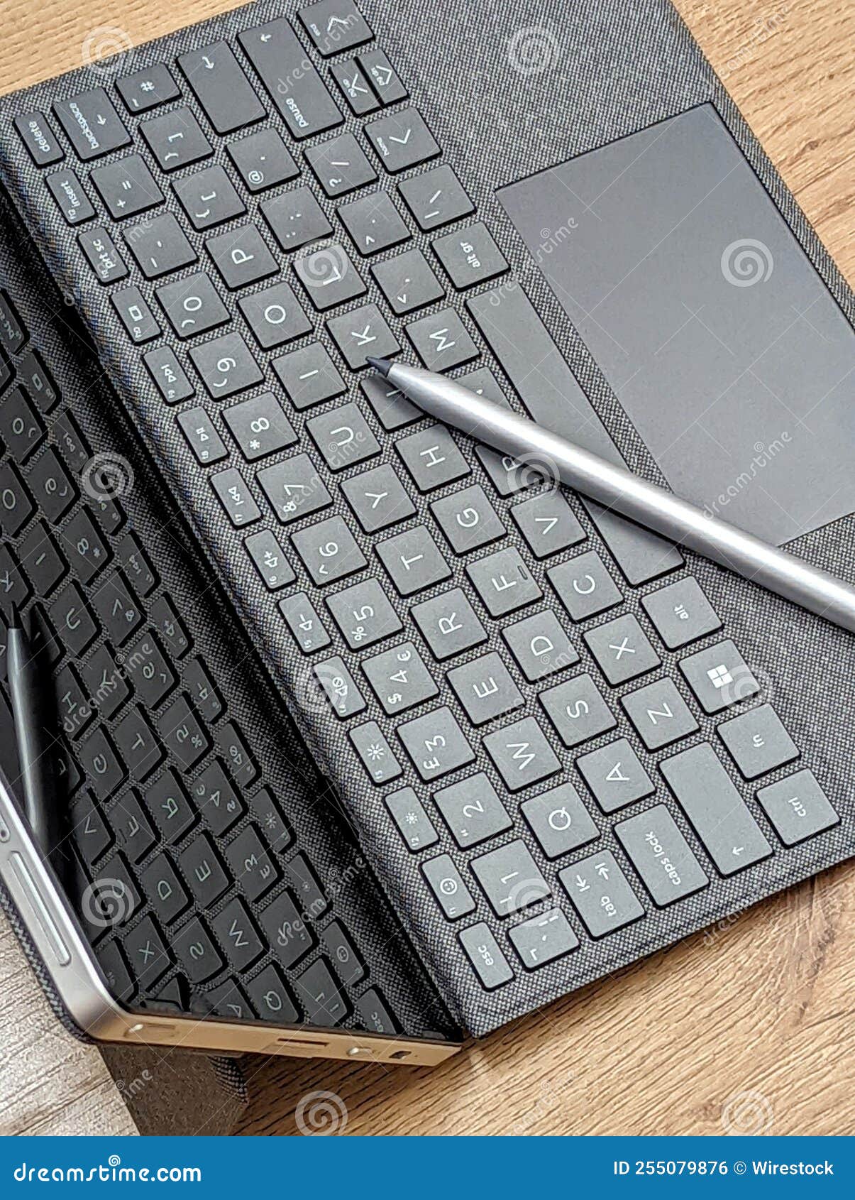 Top View of Gray Stylus on the Keyboard of Notebook and Its Reflection ...