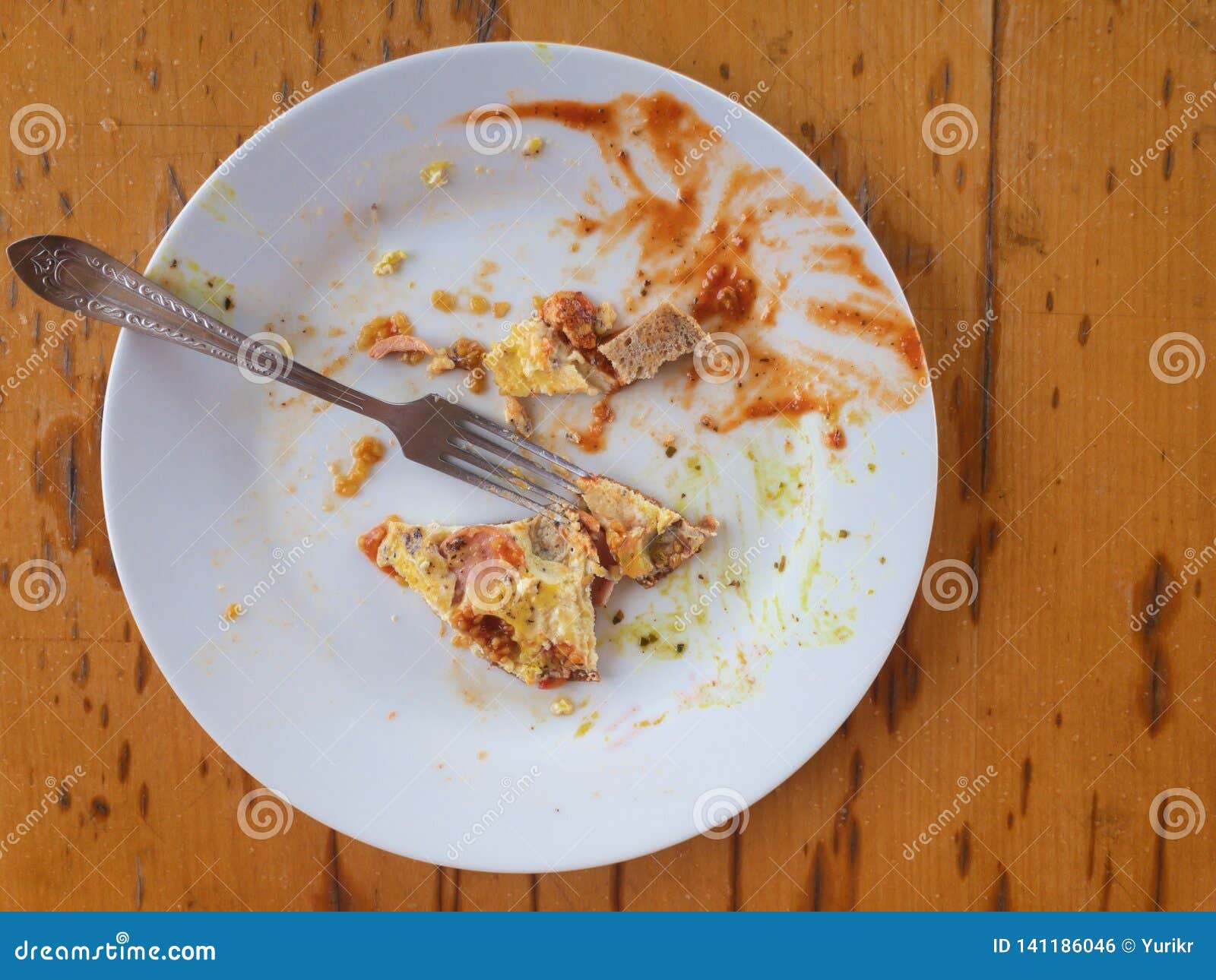 Greasy Plate with Lonely Fork, Bread and Omelette Leftovers Stock Photo ...