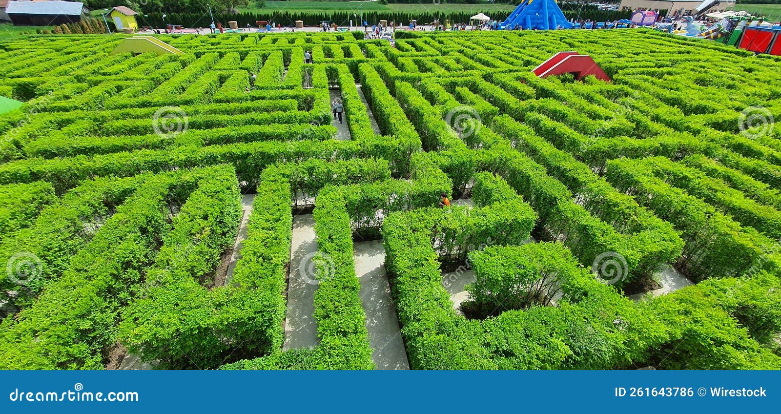Top View of Green Hedge Maze with Bridges and Concrete Pathways ...