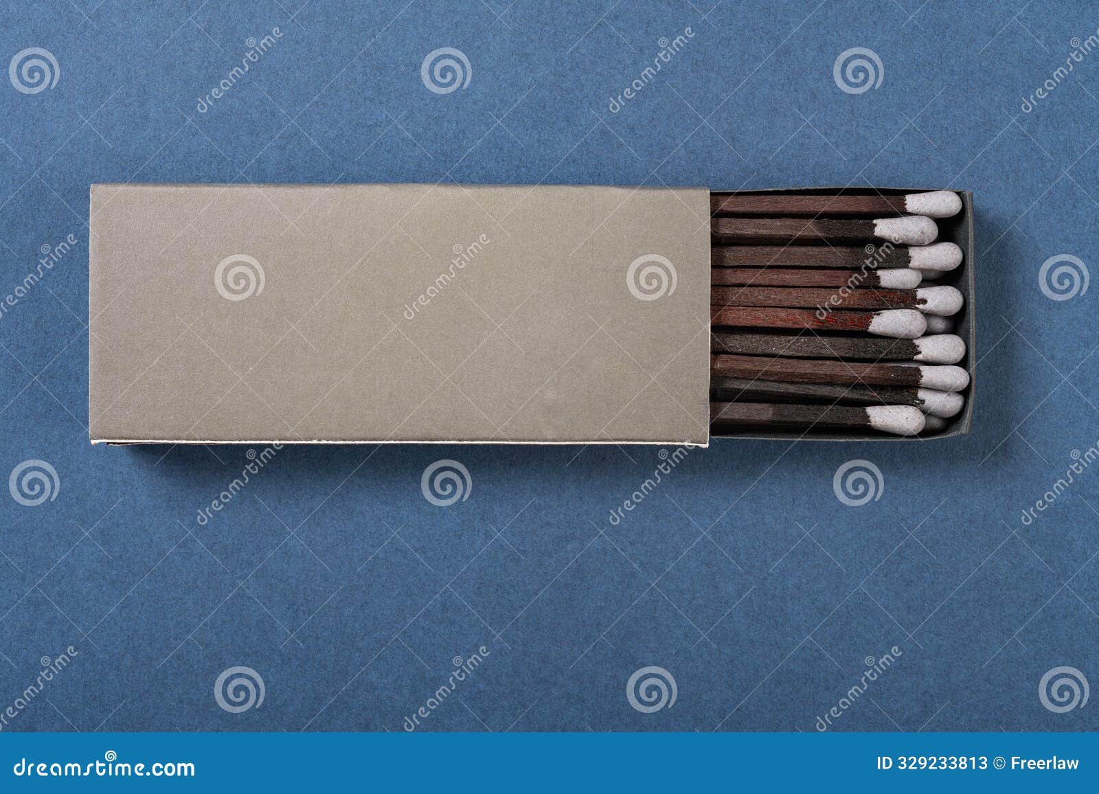 Top View Grey Color Matchbox and Grey Match Sticks on Blue Background ...