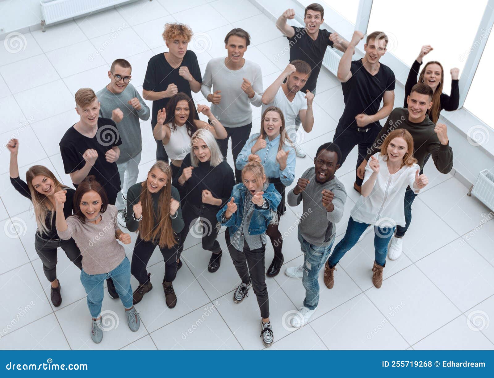 Top View. a Group of Applauding Young People Looking at the Camera ...