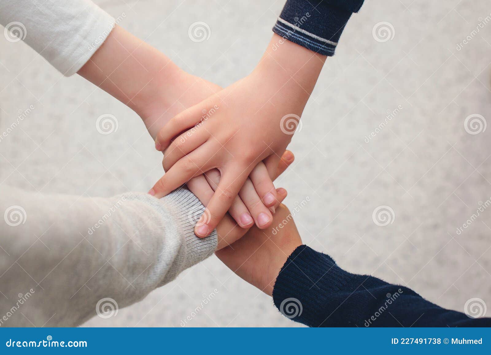 Top View Group of Children Stacking Hands Outdoors. Concept of ...