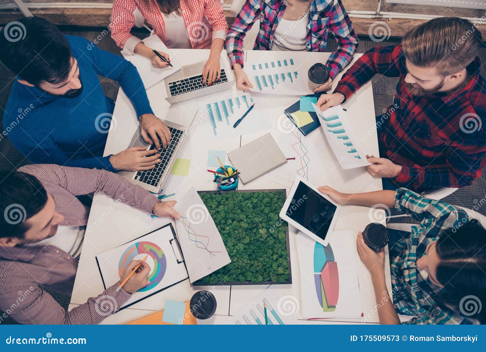 Top View of Group of People Working Hard at the Conference Desktop ...
