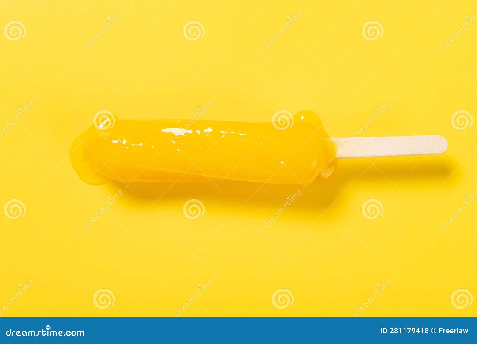 Half Melted Twisted Shaped Pineapple Flavor Popsicle on Yellow ...