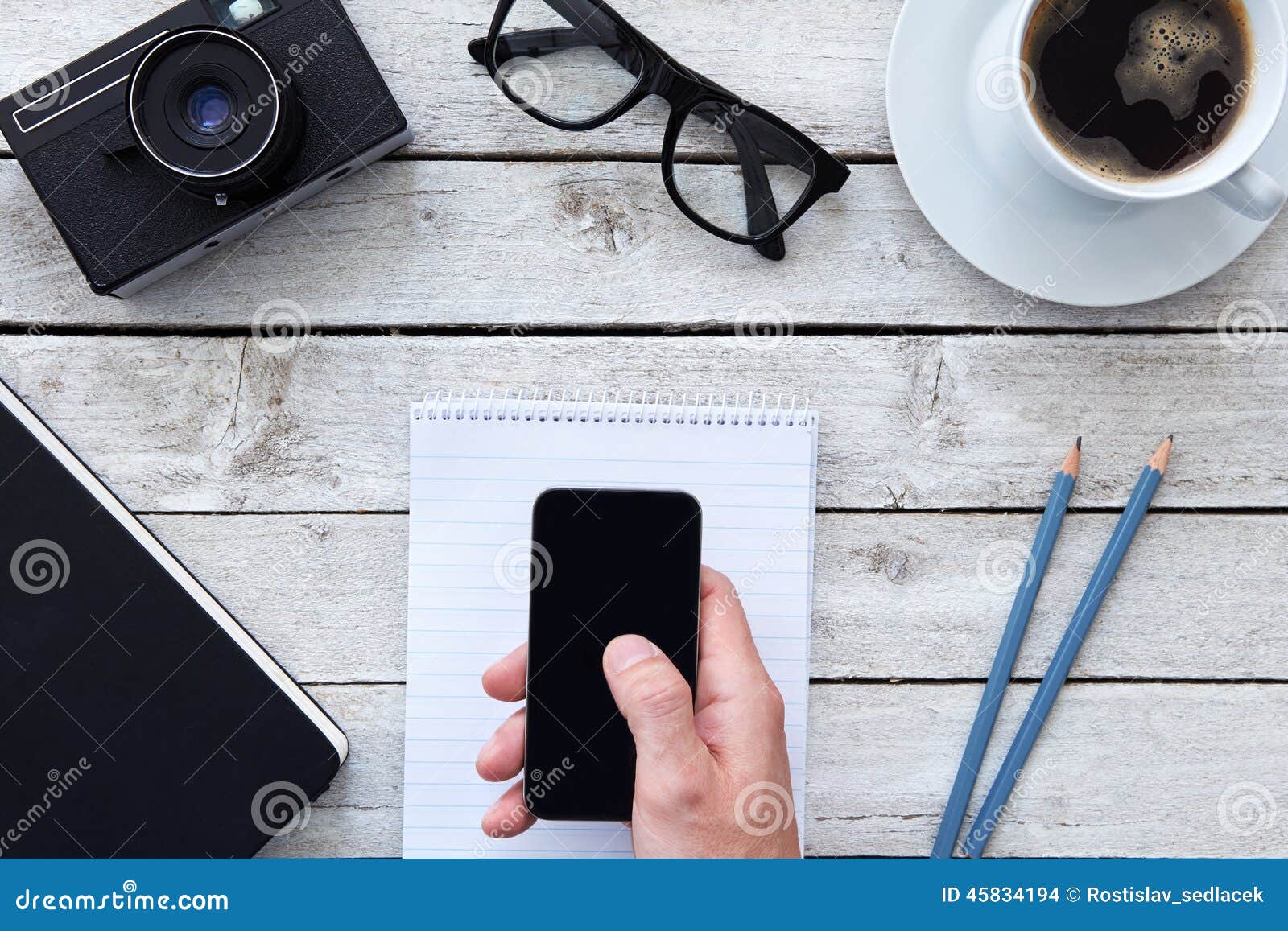 Top View of a Hand with Mobile Phone Stock Photo - Image of paper ...