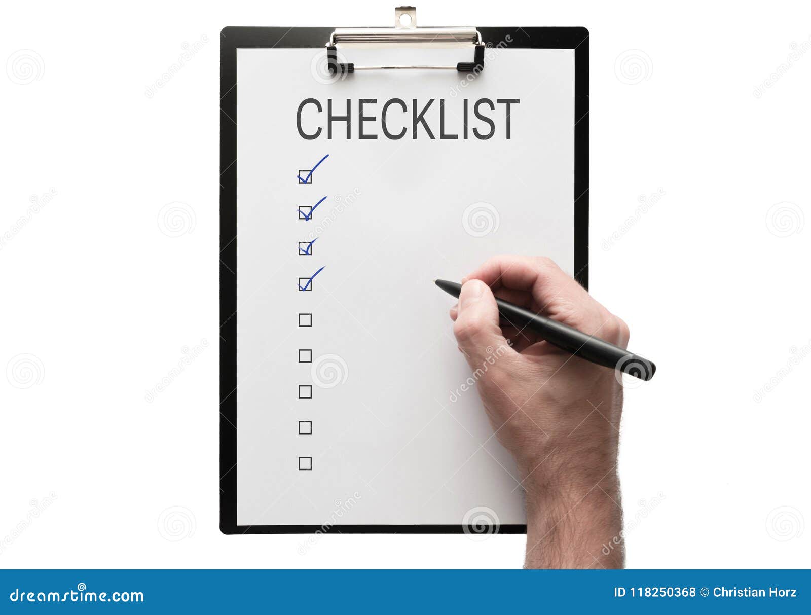 Top View of Hand with Pen on Clipboard with Checklist on White ...