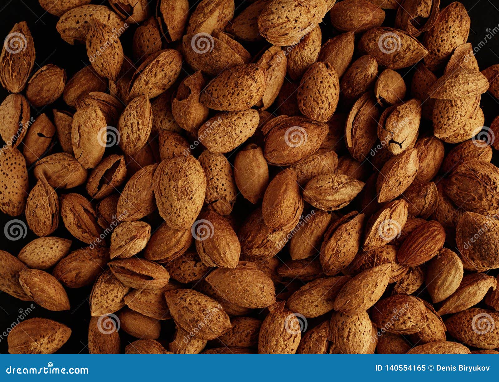 Top View of Handful of Pecans, Almonds on a Black Background. Closeup ...